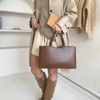 China Minimalist Solid-Color Women's Tote Bag Premium-Quality PU Leather Handbag for Daily Commuting Large Capacity Carryall with LOGO for sale