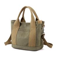 China Thickened Canvas Shoulder Bag with Large Capacity Multi-Compartment Commuting Bags for Students Compact Outings Tote with LOGO for sale