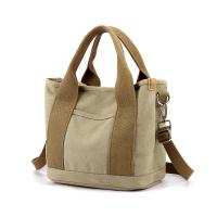 China Thickened Canvas Shoulder Bag with Large Capacity Multi-Compartment Commuting Bags for Students Compact Outings Tote with LOGO for sale