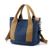 China Thickened Canvas Shoulder Bag with Large Capacity Multi-Compartment Commuting Bags for Students Compact Outings Tote with LOGO for sale