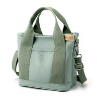 China Small Zippered Japanese Layered Bag Niche Ladies' Shoulder Tote Bag Handheld Thickened Canvas Phone Bucket Tote Bags with Logo for sale