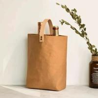 China Customized Champagne Wine Handheld Bags with Logo Printing Washable Tear-resistant Kraft Paper Made Gift Bags for sale