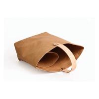 China Customized Champagne Wine Handheld Bags with Logo Printing Washable Tear-resistant Kraft Paper Made Gift Bags for sale