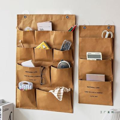 China Japanese Washable Kraft Paper Storage Pouch Wall-Hanging Bedside Door-Back Organizer Multi-Purpose Bag for Household Clutter for sale