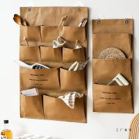 China Japanese Washable Kraft Paper Storage Pouch Wall-Hanging Bedside Door-Back Organizer Multi-Purpose Bag for Household Clutter for sale