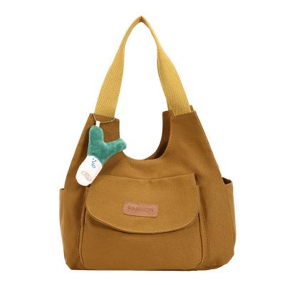 China Canvas Bags for Women Spring/Summer Versatile Tote Bag Outing Mom Student Shoulder Underarm Commuting Bags Handheld Tote Bag for sale