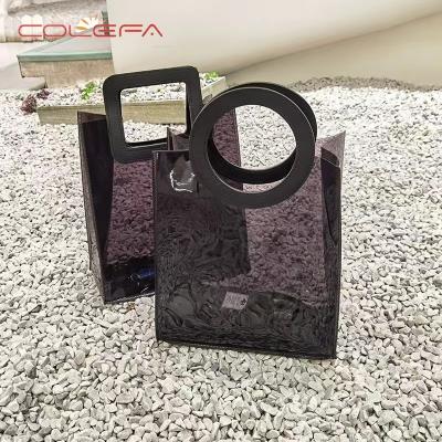 China Customized Black PVC Handheld Bag Glossy Laser Fashion-Style Gift Bag Wedding Favor Handle Open Closure Shopping Bag for sale