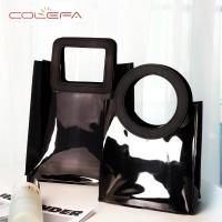 China Customized Black PVC Handheld Bag Glossy Laser Fashion-Style Gift Bag Wedding Favor Handle Open Closure Shopping Bag for sale