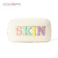 China Customizable Embroidered Letter Storage Pouch Corduroy Made Cosmetic Bag Portable Toiletry Large Capacity Makeup Bags for sale