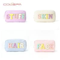China Customizable Embroidered Letter Storage Pouch Corduroy Made Cosmetic Bag Portable Toiletry Large Capacity Makeup Bags for sale