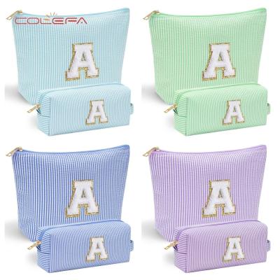 China Oxford Made Custom Set Alphabet Makeup Bag Travel Personalized Combination Large Capacity Cute Travel Tote Organizer for sale