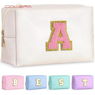 China 26 Embroidered Letter PU Leather Made Cosmetic Toiletry Bag Large Capacity Octagonal Travel Organizer Makeup Clutch for sale