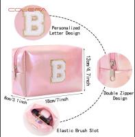 China Pearlescent PU Leather Embroidered Letter Makeup Bag Large Capacity Toiletry Bag Travel Daily Organizer Clutch Cosmetic Bags for sale