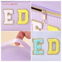 China Polyester Handheld Embroidered Letter Makeup Bags Large Capacity Wide-Opening Multi-Functional Storage Pouch Preppy-Style Toiletry Bag for sale