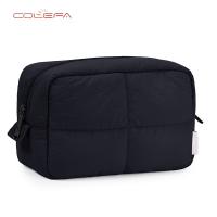 China New Quilted Cosmetic Bag Thickened Quilted Washbag Cotton-Filled Fabric Travel Cosmetics Organizer Portable Storage Bag for sale
