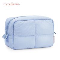 China New Quilted Cosmetic Bag Thickened Quilted Washbag Cotton-Filled Fabric Travel Cosmetics Organizer Portable Storage Bag for sale