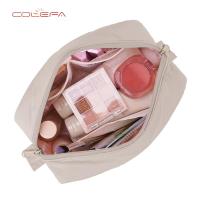 China New Quilted Cosmetic Bag Thickened Quilted Washbag Cotton-Filled Fabric Travel Cosmetics Organizer Portable Storage Bag for sale