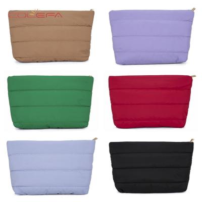 China 2026 Solid-Color Minimalist Nylon+Cotton-Filled Small Square Cosmetic Bag New Korean Style Fashionable Casual Bag Stylish Commuting Clutch for sale