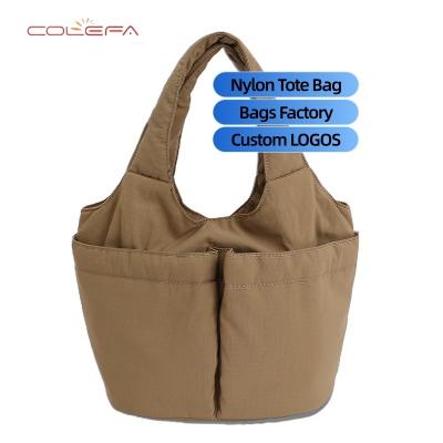 China Custom LOGO Niche Nylon Shoulder Tote Bags Large Capacity Handled Women's Korean Style Tote Bag with Multiple Pockets for sale