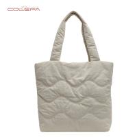 China Soft Tote Bag for Women Commuting & Study Use Lightweight Nylon+Cotton-Filled Shoulder Tote Bag Solid Color Waterproof Handbag for sale