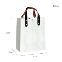 China Eco-Friendly Washable Kraft Paper Tote Bag Portable Luxury Commuting Pouch for Office Essentials Book Carryall for Daily Commute for sale