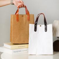 China Eco-Friendly Washable Kraft Paper Tote Bag Portable Luxury Commuting Pouch for Office Essentials Book Carryall for Daily Commute for sale