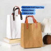 China Eco-Friendly Washable Kraft Paper Tote Bag Portable Luxury Commuting Pouch for Office Essentials Book Carryall for Daily Commute for sale