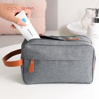 China Men's Travel Toiletry Bag Double-Layer Large Capacity Cosmetic Pouch Solid-Color Oxford Storage Bag Convenient Handheld Tote for sale