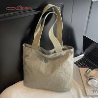 China Customized Casual Lightweight Minimalist Nylon Bag New Women's Tote Bag Simple Mini Versatile Handheld Book Storage Bag for sale