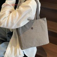 China Customized Casual Lightweight Minimalist Nylon Bag New Women's Tote Bag Simple Mini Versatile Handheld Book Storage Bag for sale