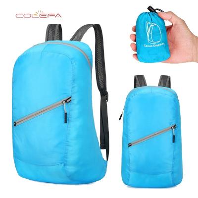 China New Outdoor Foldable Skin Nylon Made Bag Super Lightweight Portable Backpack Travel Unisex Sports Storage Backpack with LOGO for sale