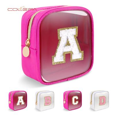 China Wholesale Waterproof Transparent PVC Embroidered Letter Cosmetic Bag Large Capacity High-Fashion Travel Toiletry Bag in Stocks for sale