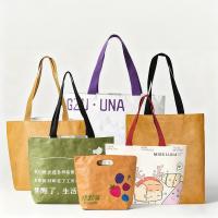 China Carrying Washable Paper Backpack Simple Design Brown Kraft Paper Backpack for sale