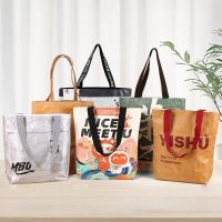 China Carrying Washable Paper Backpack Simple Design Brown Kraft Paper Backpack for sale