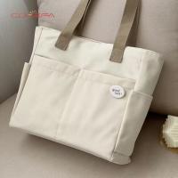 China Japanese-Style Design Tote Bag Minimalist Artsy Student Commuting Canvas Tote Casual Shoulder Bag with Handle and Zipper Closure for sale