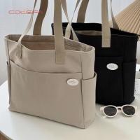 China Japanese-Style Design Tote Bag Minimalist Artsy Student Commuting Canvas Tote Casual Shoulder Bag with Handle and Zipper Closure for sale