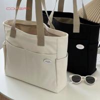 China Japanese-Style Design Tote Bag Minimalist Artsy Student Commuting Canvas Tote Casual Shoulder Bag with Handle and Zipper Closure for sale