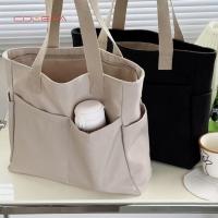 China Japanese-Style Design Tote Bag Minimalist Artsy Student Commuting Canvas Tote Casual Shoulder Bag with Handle and Zipper Closure for sale