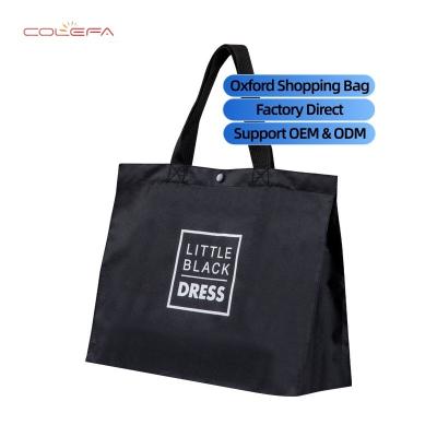 China Oxford Fabric Black Shopping Bag Modern Travel Eco-Friendly Tote Supermarket Bag Large Capacity Foldable Thickened Storage Bag for sale