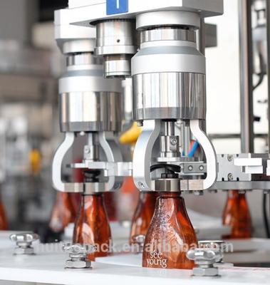 China AC380V Glass Bottle Capping Machine 6000BPH With Four Claws Structure for sale