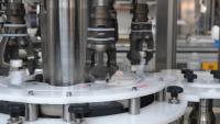 China Cosmetic Water Pressure Inner Plug Cap And Round Cap Screwing Machine for sale