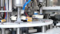 China Cosmetic Water Pressure Inner Plug Cap And Round Cap Screwing Machine for sale
