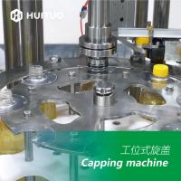 China Huituo Compact Multifunctional 2 In 1 Edible Oil Filling Capping Machine 1500bph for sale