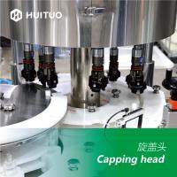 China Huituo 7200bph Automatic Capping Machine For Round Cap Baby Oil for sale