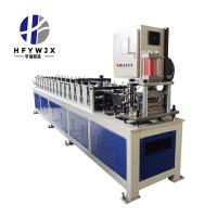 China High Precision PLC Controlled Roller Shutter Door Roll Forming Machine 15–16M/Min for sale