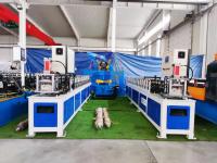 China High Precision PLC Controlled Roller Shutter Door Roll Forming Machine 15–16M/Min for sale