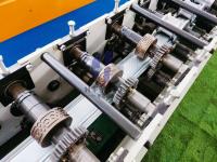 China High Precision PLC Controlled Roller Shutter Door Roll Forming Machine 15–16M/Min for sale