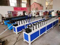 China High Precision PLC Controlled Roller Shutter Door Roll Forming Machine 15–16M/Min for sale