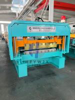 China 690mm Small Corrugated Roof Sheet Roll Forming Machine with PLC Touch Screen Control and Servo Flying Cut for sale