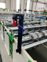 China Fast Installation Heavy Duty Trapezoidal Roll Forming Machine for Large Area Roof Panel Production for sale